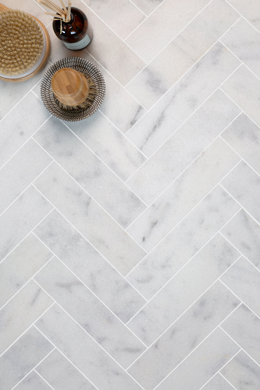 Carrara Bianco Honed Marble Herringbone Metro | Quorn Stone