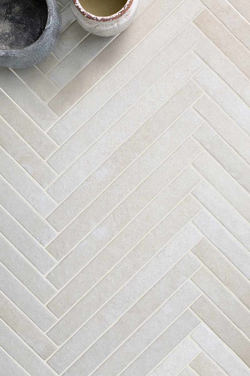 Castello Ivory Tumbled Herringbone Porcelain Tiles | Quorn Stone