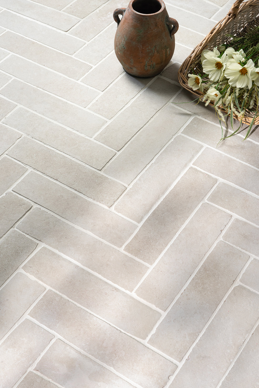 Hambleton Ivory Rustic Edge Porcelain Herringbone Cobbles | Quorn Stone